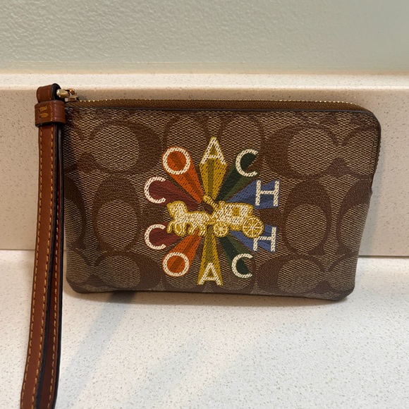 Coach | Bags | Coach Corner Zip Wristlet In Signature Canvas With Coach ...